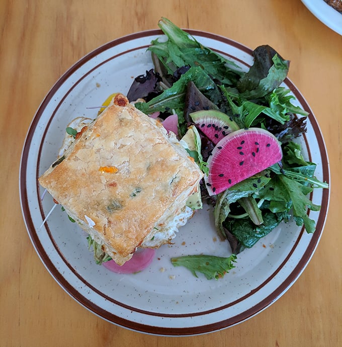 Who said salad can't be exciting? Flaky pastry meets vibrant greens and that showstopping watermelon radish – proof that healthy can be downright photogenic.