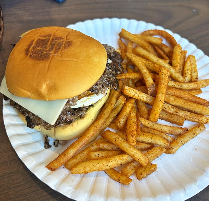 Their burger game is strong too – a perfectly seasoned patty with melty cheese and crispy, seasoned fries.