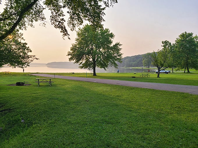 Morning light bathes the lakeside picnic grounds, where every table comes with a million-dollar view.