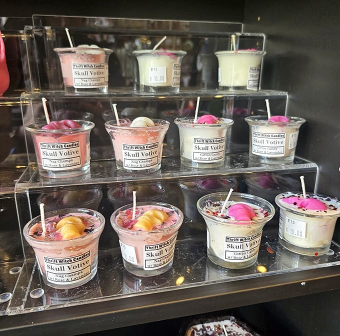 "Skull Votive" candles that somehow manage to be both macabre and delightful—like if Tim Burton designed a spa day. The pink skull embeds are an unexpectedly cheerful touch.
