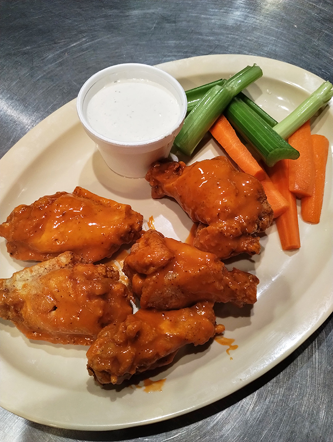 Buffalo wings that don't need a sporting event as an excuse. The crispy exterior gives way to juicy meat that's worth every napkin.