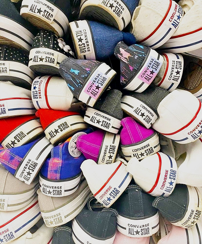 Converse heaven—a pile of All Stars that could tell a hundred stories, now waiting to walk a mile in your life.