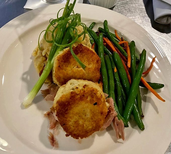 These crab cakes aren't just good, they're life-changing—perfectly golden discs of mostly-crab-minimal-filler heaven that make you question all other crab cakes you've ever known.