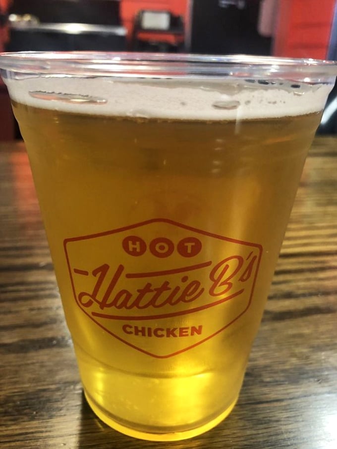 Cold beer stands ready for duty – your taste buds' first responder when the heat gets real.