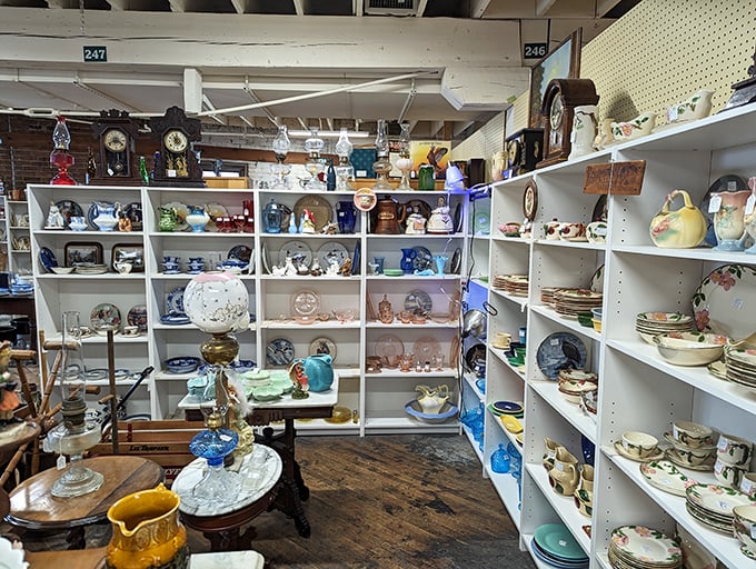 Shelves of china and glassware sparkle under the lights – each piece silently wondering if it will finally complete someone's grandmother's collection.