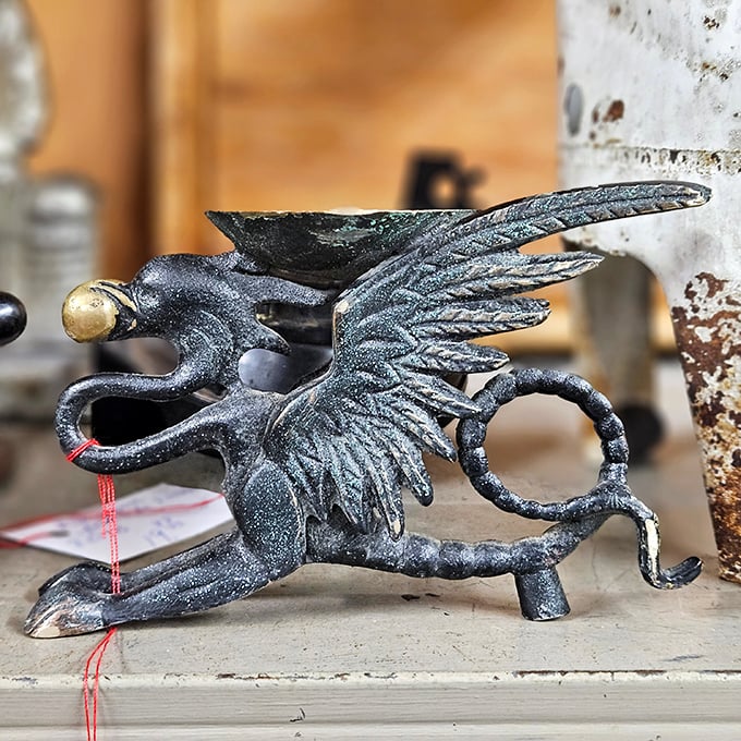 This metal dragon figurine isn't just decorative—it's conversation starter, bookend, and proof you have more interesting taste than your neighbor with the garden gnomes. 