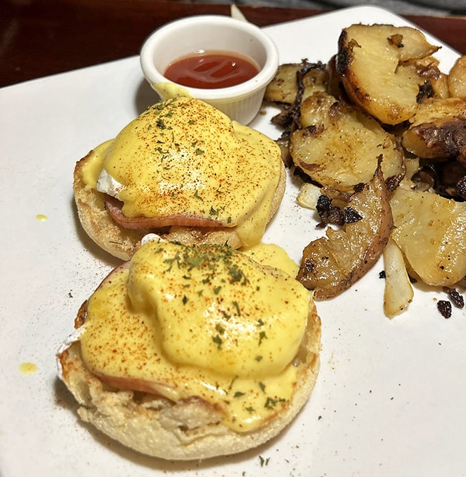 Eggs Benedict that would make a brunch skeptic convert. Those home fries aren't just a side dish—they're a supporting actor worthy of their own award.