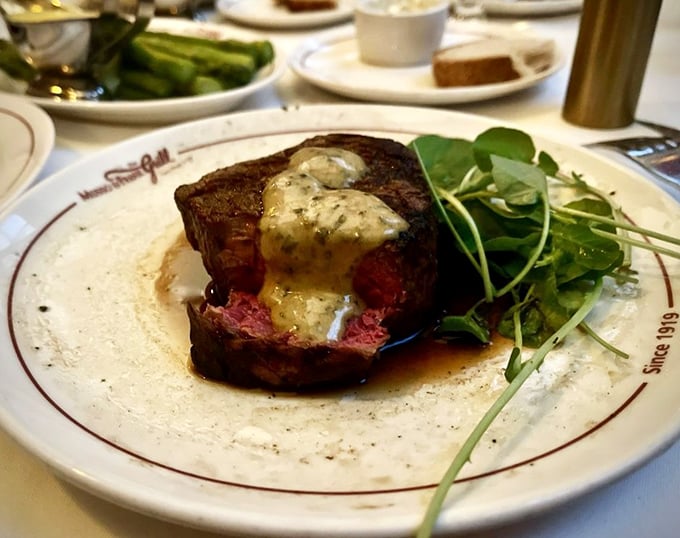 The filet mignon arrives like royalty, crowned with herb butter. This is beef that doesn't need a publicist – it's already famous.