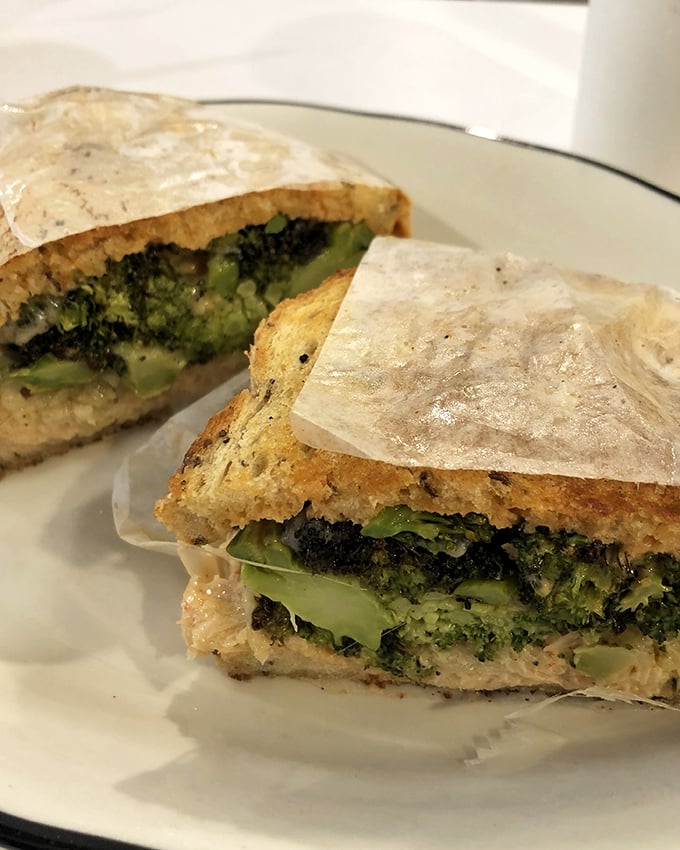 Not just another veggie sandwich—this broccoli-packed creation proves Middle Child treats vegetables with the same reverence as their meaty counterparts.