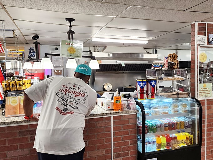 The food counter – where hunger meets opportunity, and the universal language of "I'll take one of those" transcends all shopping boundaries.
