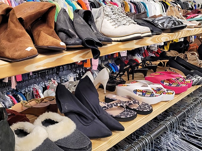 A footwear fantasyland where barely-worn boots neighbor pristine pumps—proof that someone's shopping regret becomes your closet's gain.