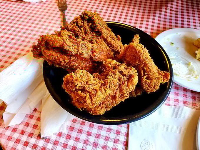 Golden fried chicken that would make Colonel Sanders question his life choices – crispy, juicy, and absolutely magnificent.