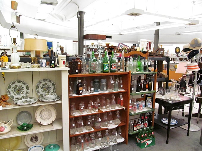 Vintage bottles line the shelves like liquid history. From classic Coca-Cola to forgotten local sodas, each one fizzing with nostalgia.