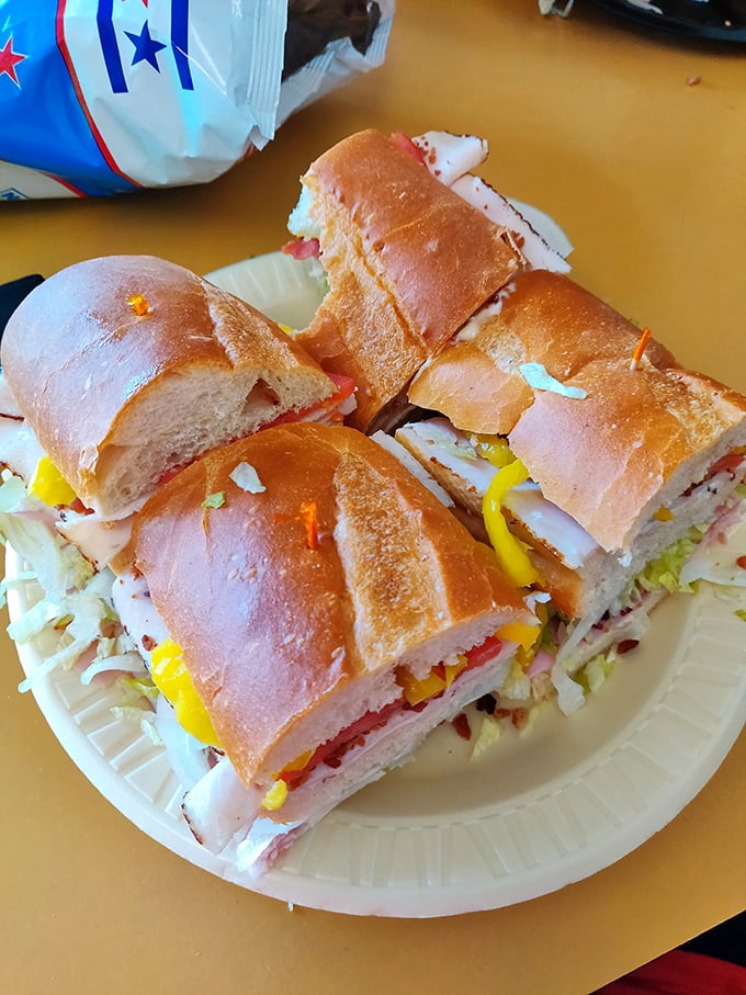 Layer upon glorious layer of meats and cheeses, these hoagies aren't just lunch – they're an edible engineering marvel worth driving across counties for.