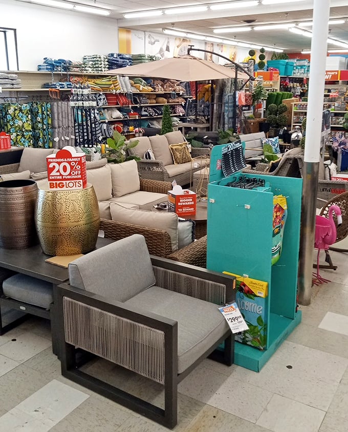 A tropical oasis emerges amid fluorescent lighting – patio furniture and decorative planters transform Ohio living rooms into staycation destinations year-round.