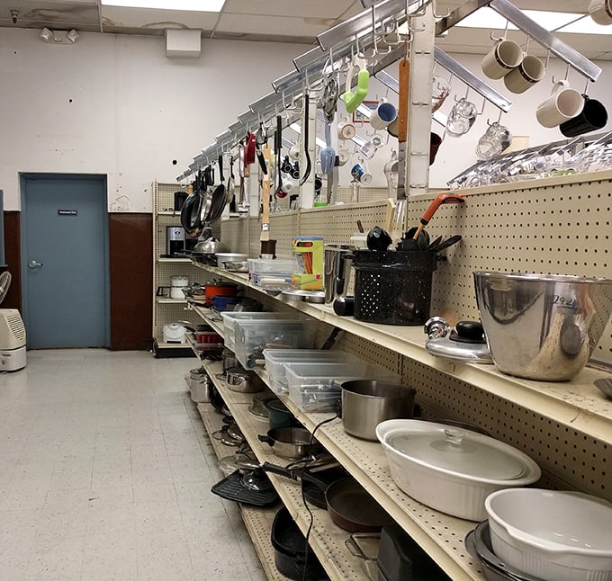 Julia Child would approve of this kitchenware collection—hanging pots, practical pans, and enough serving bowls to feed a neighborhood.