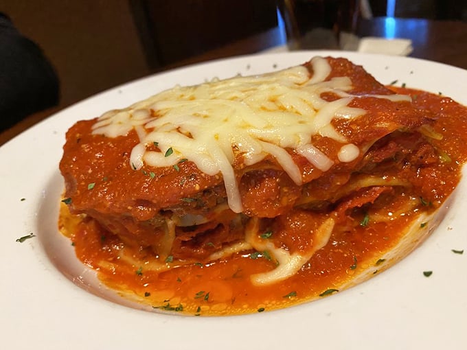 Behold the lasagna that launched a thousand road trips. Those layers aren't just pasta—they're chapters in a delicious story.