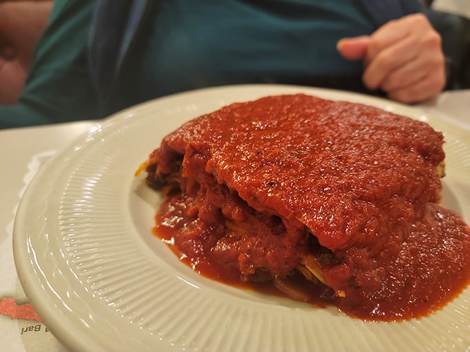 This isn't just lasagna—it's an archaeological dig through layers of culinary history, with each stratum revealing new depths of tomato-rich flavor.