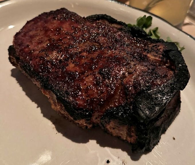 The New York strip—charred to perfection on the outside, blushing pink within—makes a compelling case for simplicity over showmanship.