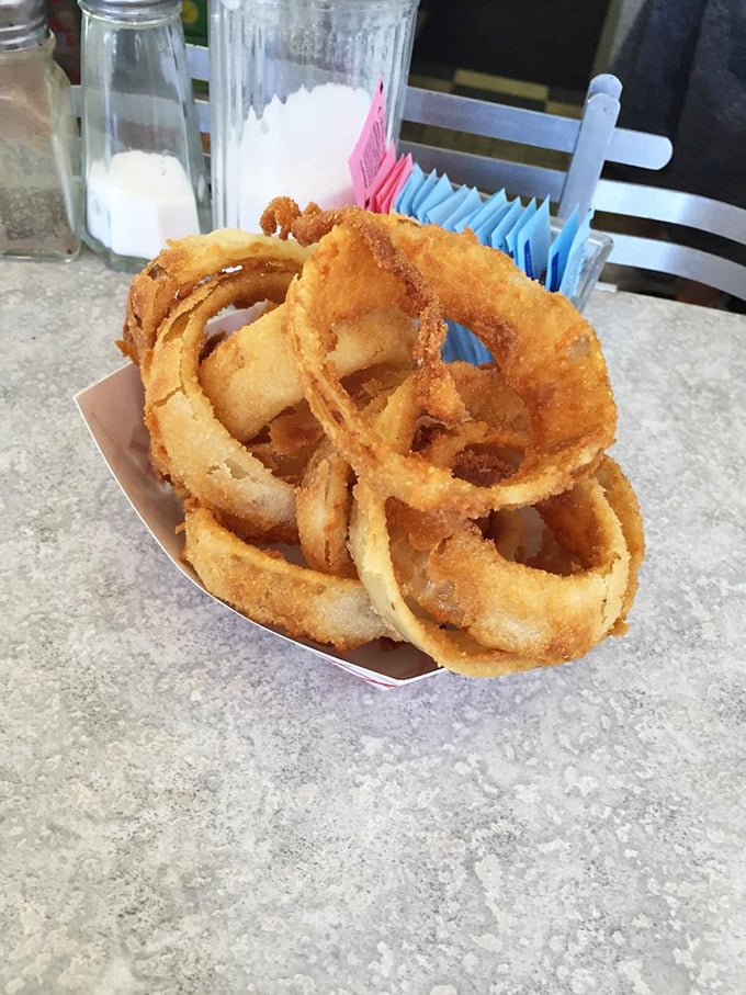 Golden halos of happiness that make you question why anyone would waste time with lesser onion rings. These are the real deal.