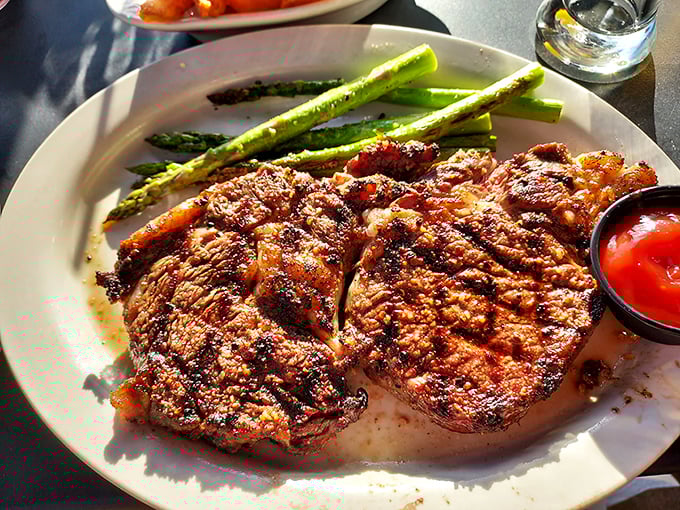 This isn't just a steak—it's a masterclass in meat preparation. Those grill marks aren't decoration; they're flavor geography mapping out your next several moments of pure bliss.
