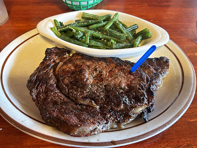 A ribeye that's been kissed by fire and blessed with seasoning—this isn't just dinner, it's a religious experience for meat lovers.