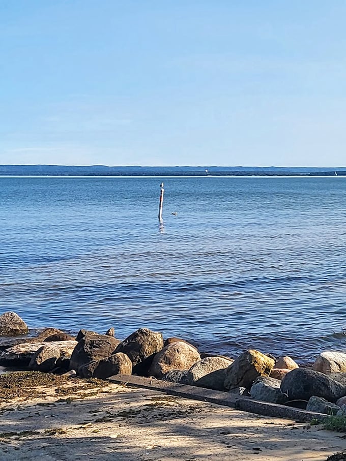 Superior's crystal waters meet Brimley's rocky edge – a geological handshake millions of years in the making.