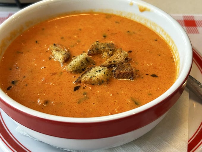 This tomato soup with croutons looks like autumn in a bowl, the kind that makes you forget your troubles.