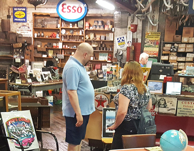 The museum's front desk area feels like stepping into your eccentric uncle's garage – if your uncle happened to collect every gas station sign since 1940.