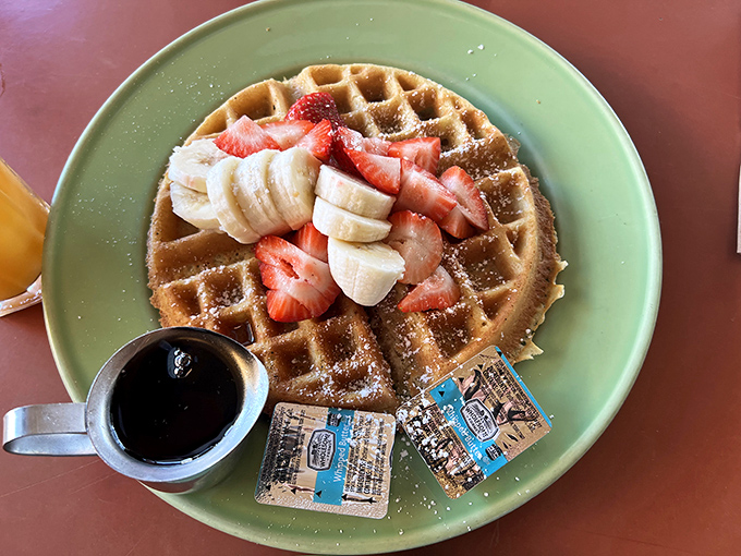 This isn't just a waffle – it's a platform for fruit-topped happiness that makes Monday mornings suddenly bearable.