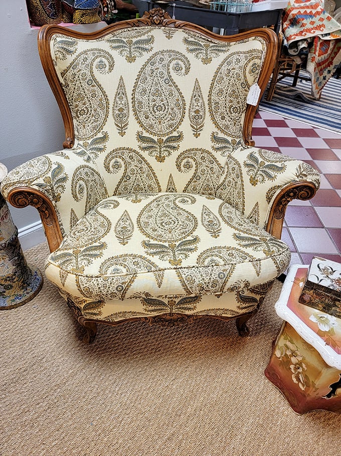 The paisley-upholstered throne awaits! This statement chair doesn't just offer a seat—it offers conversation, character, and unexpected comfort.