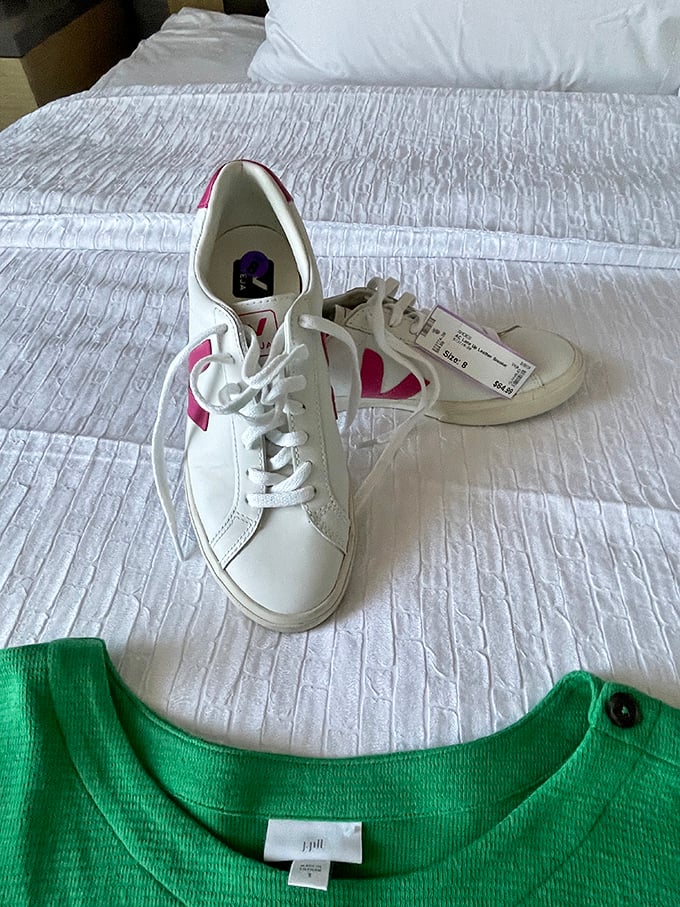 Sneaker seekers rejoice: These pristine kicks with their pop of pink prove that sometimes the best fashion statements have already been broken in by someone else.