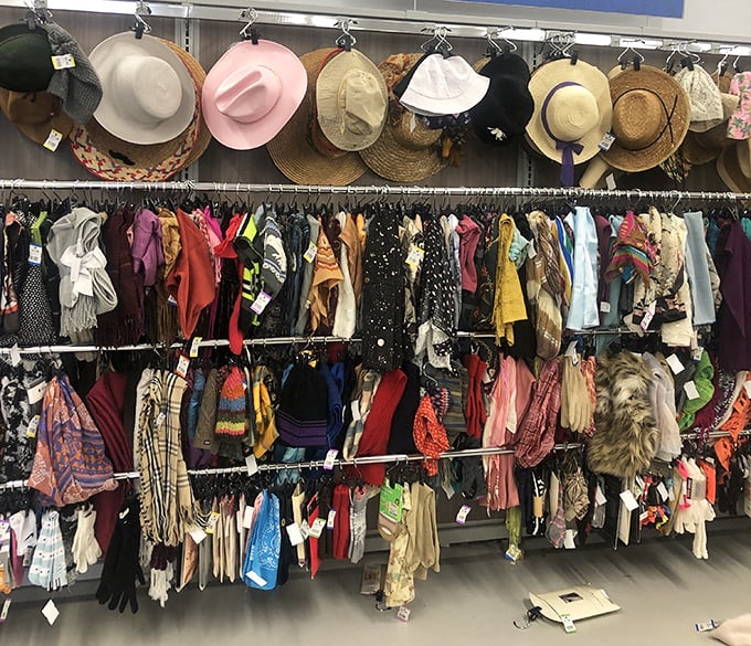 A hat and scarf bonanza that would make Carmen Miranda jealous. Winter accessories or summer statement pieces—fashion history hangs in the balance.