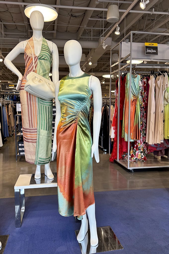 These mannequins aren't just displaying clothes; they're silently judging your current outfit while tempting you with sunset-hued silk that flows like desert dreams.