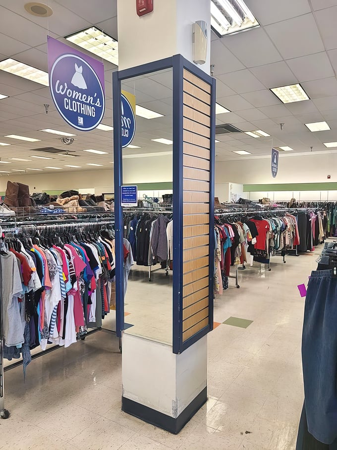The women's clothing department—a color-coded wonderland where designer labels hide among everyday basics like truffles in a forest.