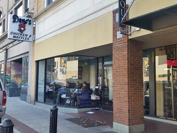 Dame's sleek storefront promises something special - where chicken meets waffle in beautiful, delicious harmony.