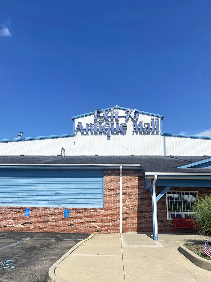Exit 76 Antique Mall announces itself with sky-blue confidence—the Las Vegas of antiquing without the slot machines.