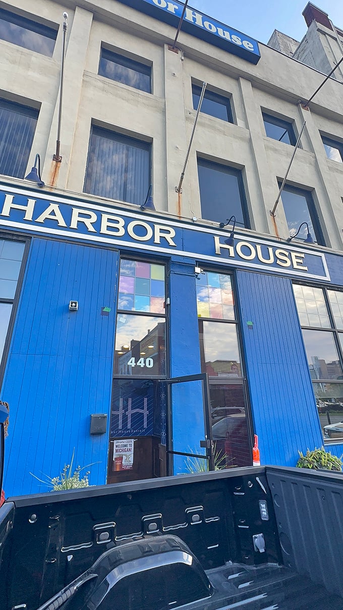 Harbor House's bold blue exterior stands like a beacon for anyone craving authentic waterfront dining vibes.