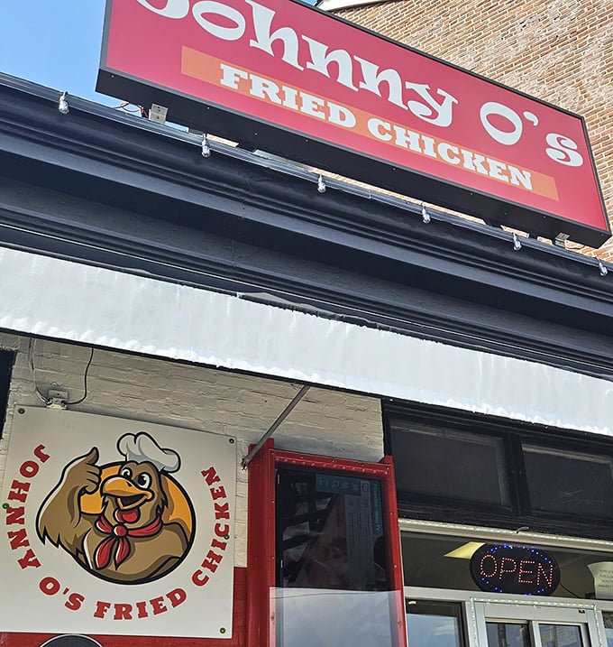 Johnny O's vibrant red building stands out like a tasty landmark – the chicken equivalent of a lighthouse guiding hungry sailors home.