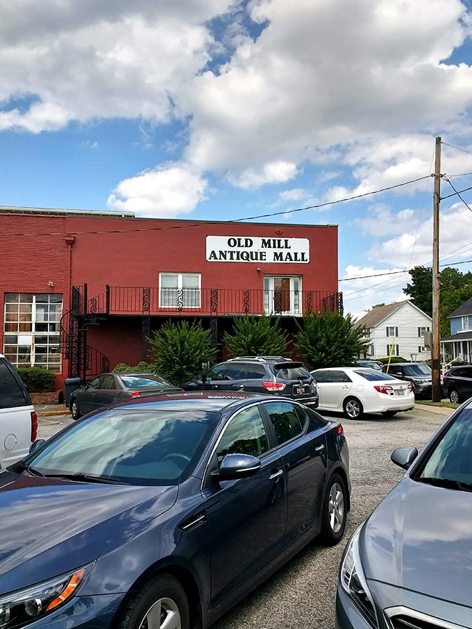 This former mill now spins tales instead of textiles - that red brick facade holds more history than a Ken Burns documentary.
