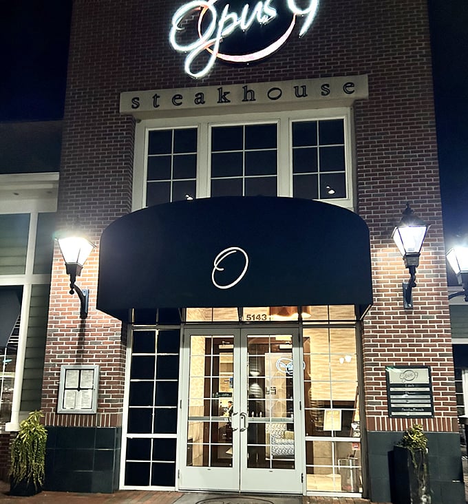 Opus 9's elegant nighttime glow isn't just inviting—it's practically a siren song for steak enthusiasts.