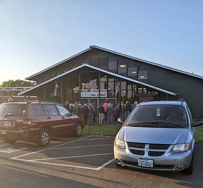 Picc-A-Dilly's distinctive A-frame entrance is like a starting gate for bargain hunters. The flags aren't just patriotic—they're waving you toward undiscovered treasures!