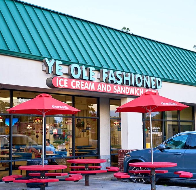 Red picnic tables and turquoise trim - like eating at a 1950s beach party. 