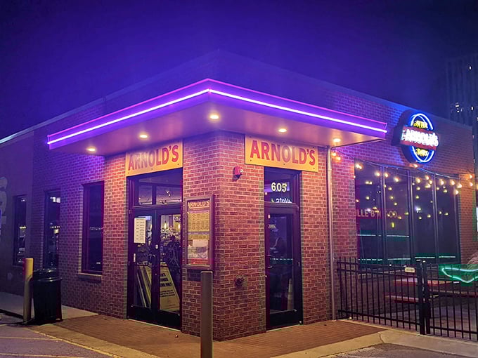 That pink awning is like a beacon in the night, guiding hungry souls to Arnold's legendary meat-and-three paradise.