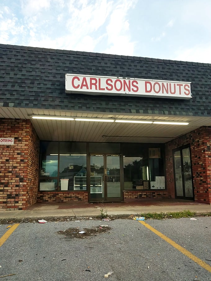The simple storefront hides time-honored donut craftsmanship. Sometimes the most unassuming places guard the sweetest treasures.