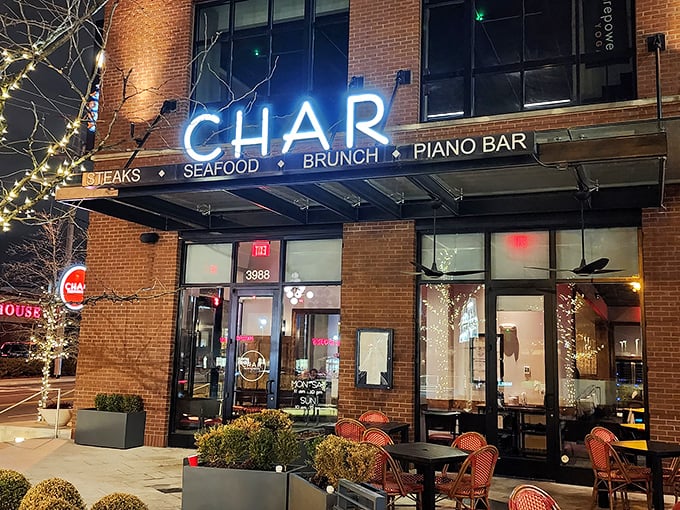 When those neon letters light up, you know serious steak magic is happening inside.