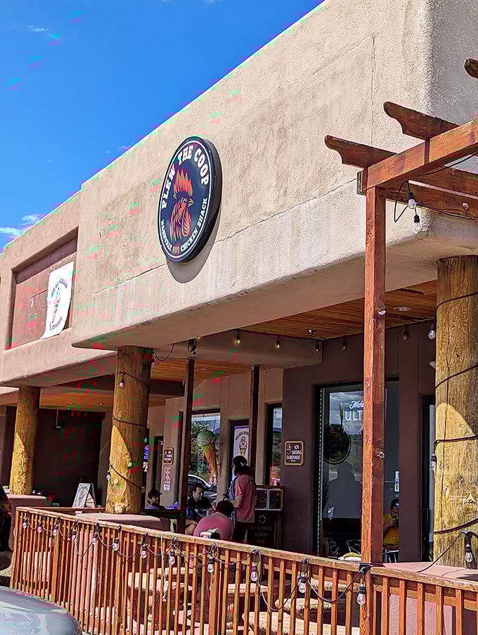 That rustic stone facade hints at the comfort food treasures waiting inside this desert oasis.