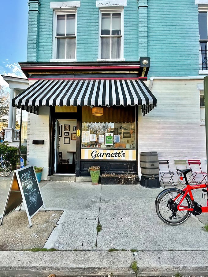 The classic striped awning and tiny storefront prove that sometimes the best things really do come in small packages.