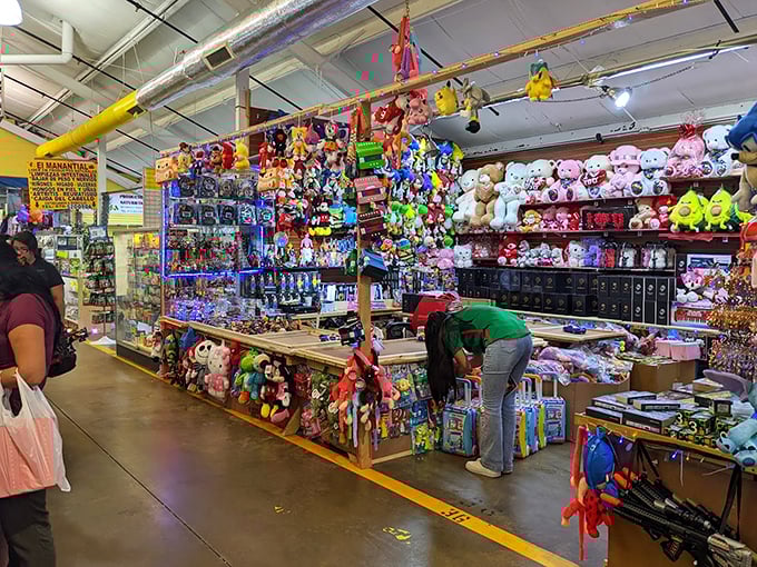 This indoor toy paradise looks like Santa's workshop exploded in the most delightful way, with every childhood dream hanging from the rafters.
