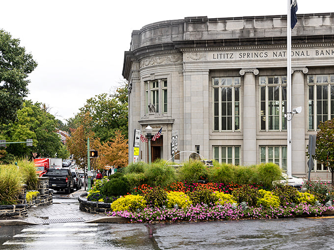 Tree-lined streets in Lititz create natural tunnels of tranquility perfect for leisurely afternoon walks.